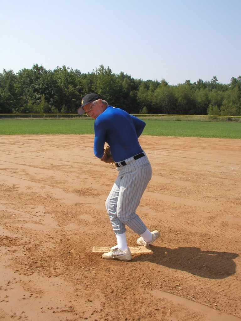 Can I bring the ball behind my back? - 10 Man Modified Softball